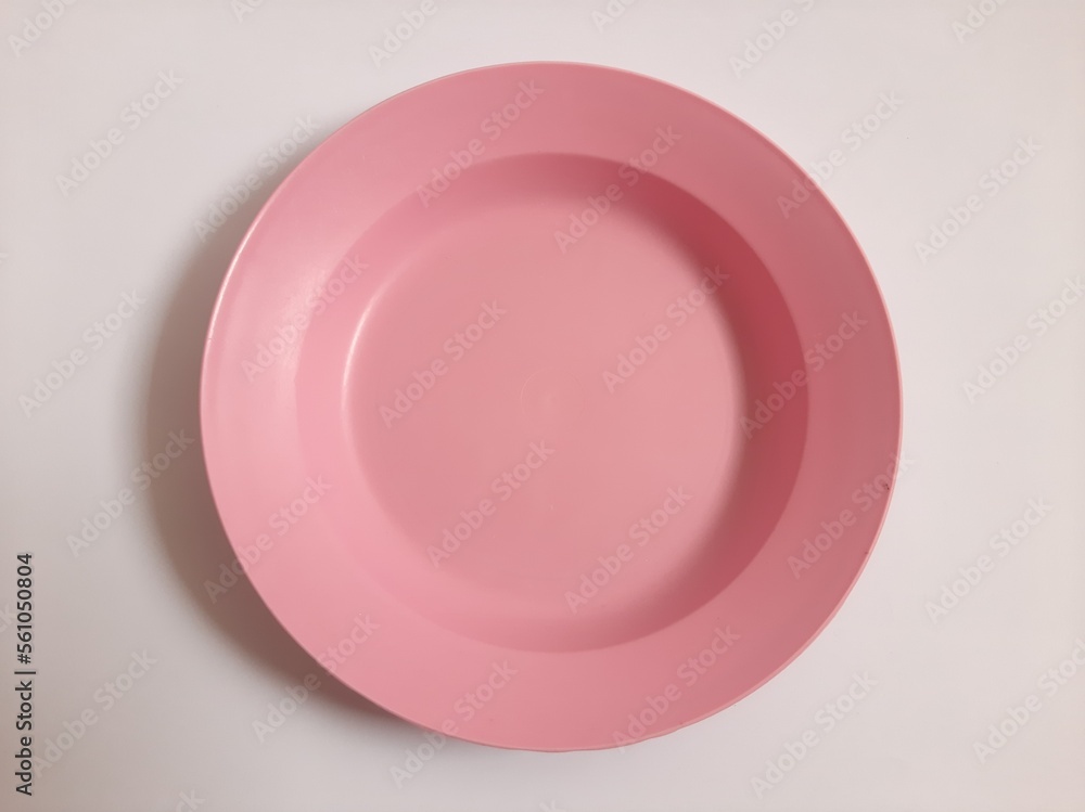 Top view empty plastic pink plate on isolated white background Stock ...
