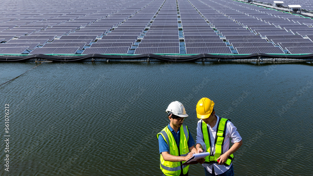 Engineer working setup Floating solar panels or solar cell Platform ...