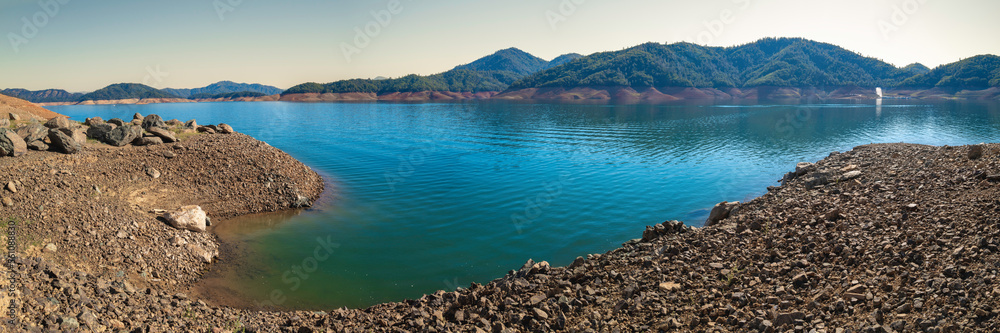 Shasta Lake at low water level with the gravel lake bed exposed in the ...