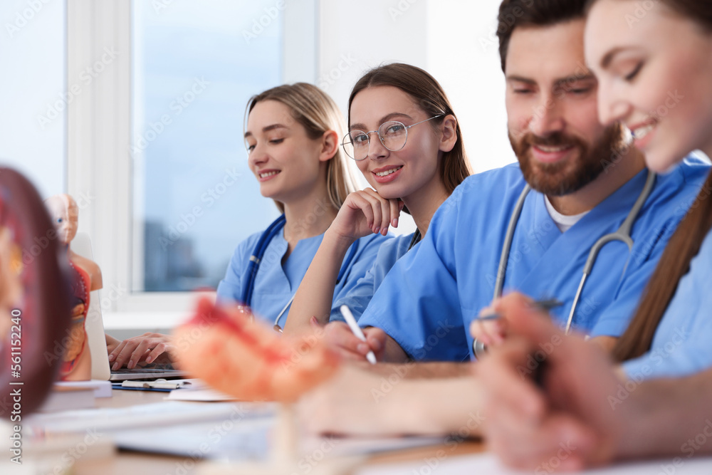 Medical students in uniforms studying at university Stock Photo | Adobe ...
