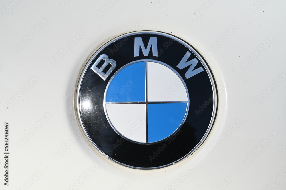 BMW sign on a car. Bayerische Motoren Werke is a German manufacturer of ...