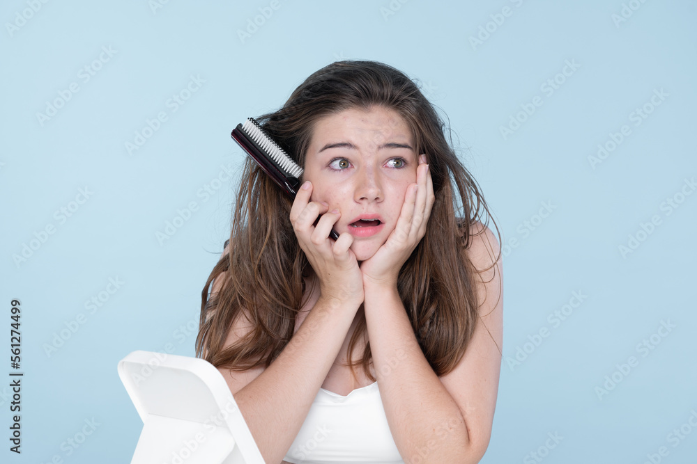Beautiful girl feel sad, worry about her damaged hair with isolated ...