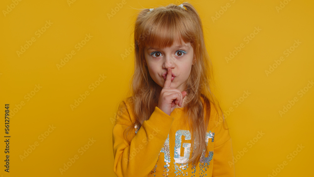 Shh be quiet please. Preteen child girl kid presses index finger to ...