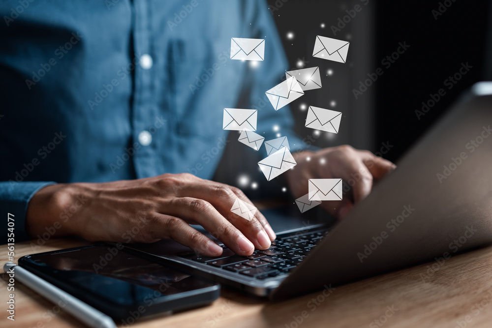 Businessman receive email by laptop computer from customer, business ...