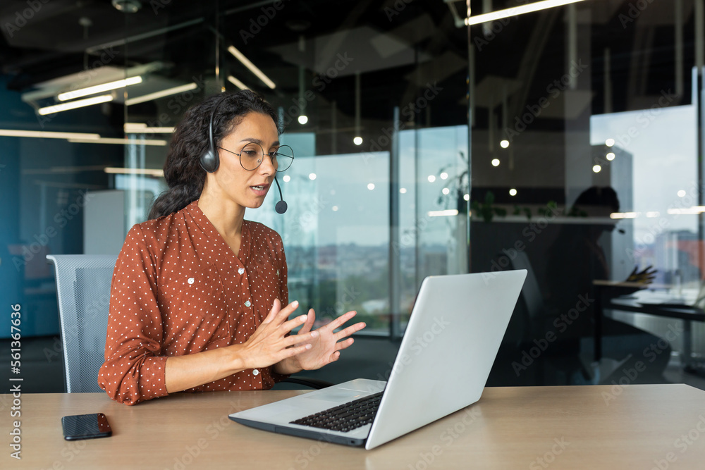 Video call online meeting with colleagues, Hispanic woman working ...