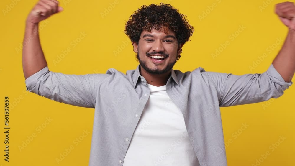 Strong sporty fitness young Indian man 20s wearing casual grey shirt ...