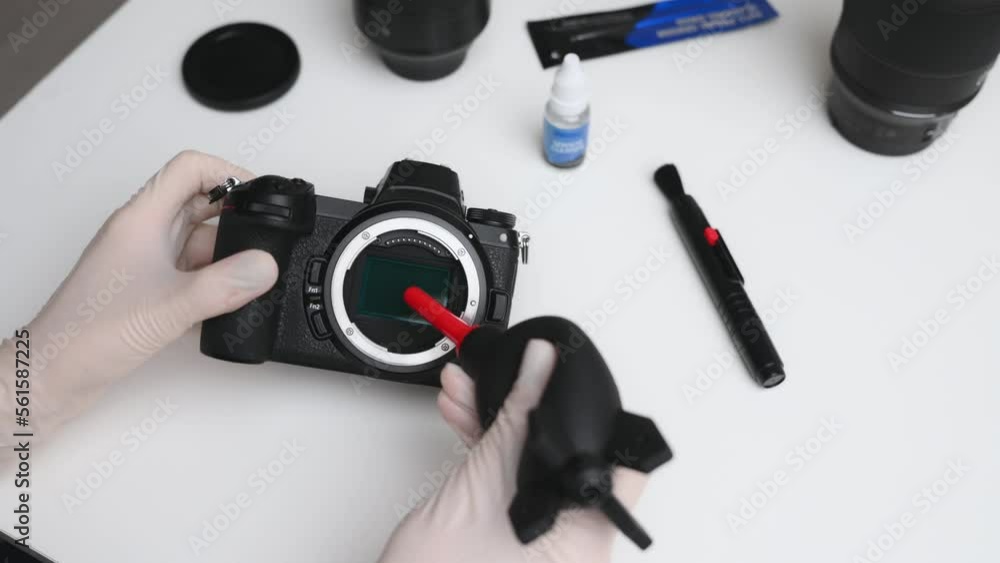 Cleaning the camera sensor with a blower for office equipment and ...