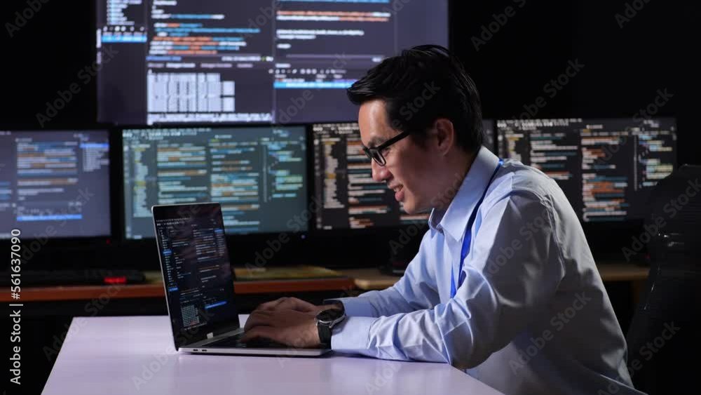 Video „Side View Of Asian Male Programmer Celebrating Succeed Writing ...