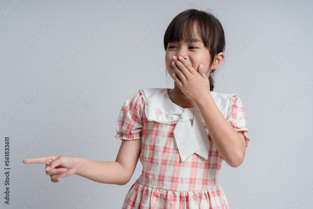Child with gesture smells bad. Child covers nose with hand, smells ...