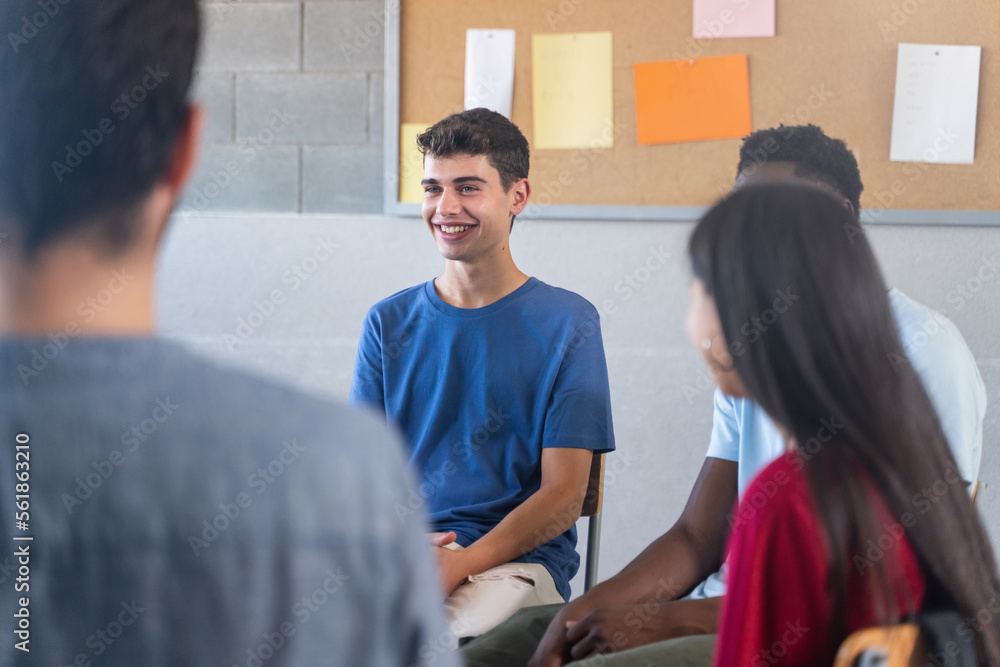Happy Teenager student talking to classmates - Support Group discussion ...