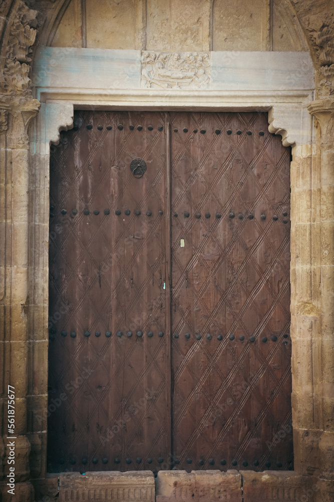 Detail of an inn door and stone walls from the Ottoman medieval period ...