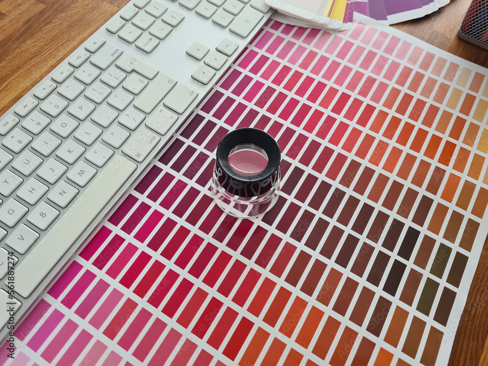 Magnifying glass on series of color palette swatches Stock Photo ...