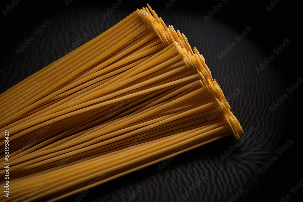 stale spaghetti. black background with a top perspective. Useful ...