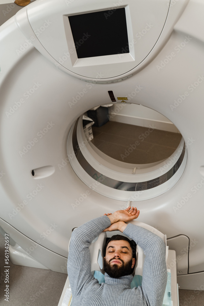 Patient lies on computed tomography bed and scanning lungs for diagnose ... Patient lies on computed tomography bed and scanning lungs for diagnose ...