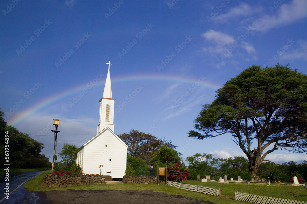 Tsunami warning system siren, church, cemetery and rainbow on the ...