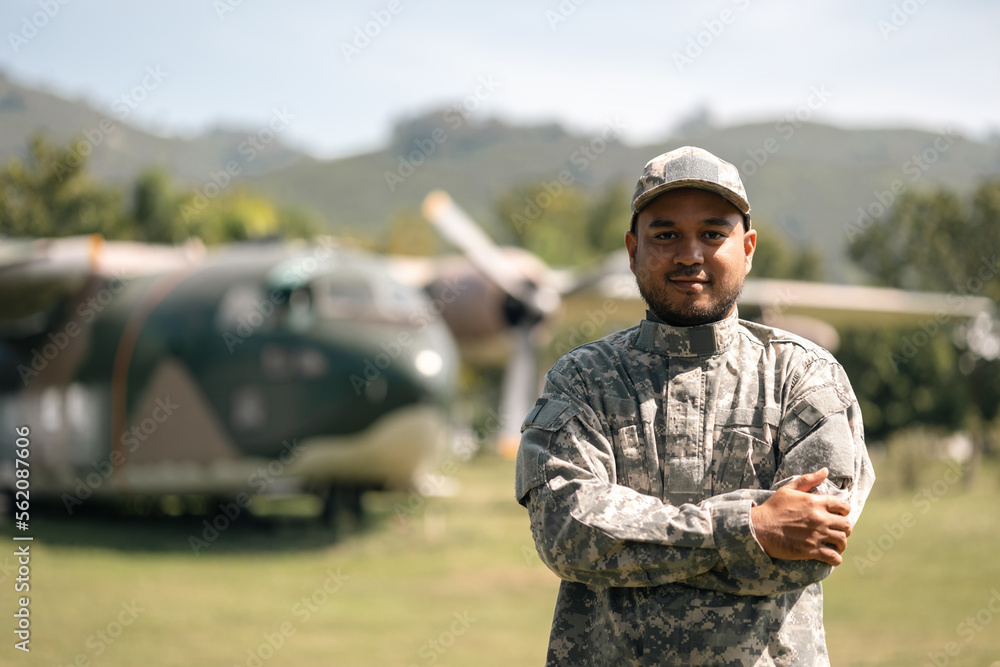 Asian man special forces soldier standing against on the field Mission ...