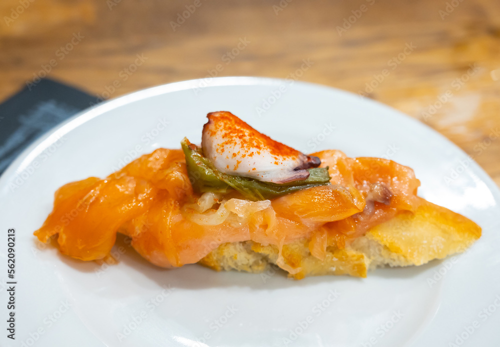 Board with typical snacks of Basque Country, pinchos or pinxtos ...