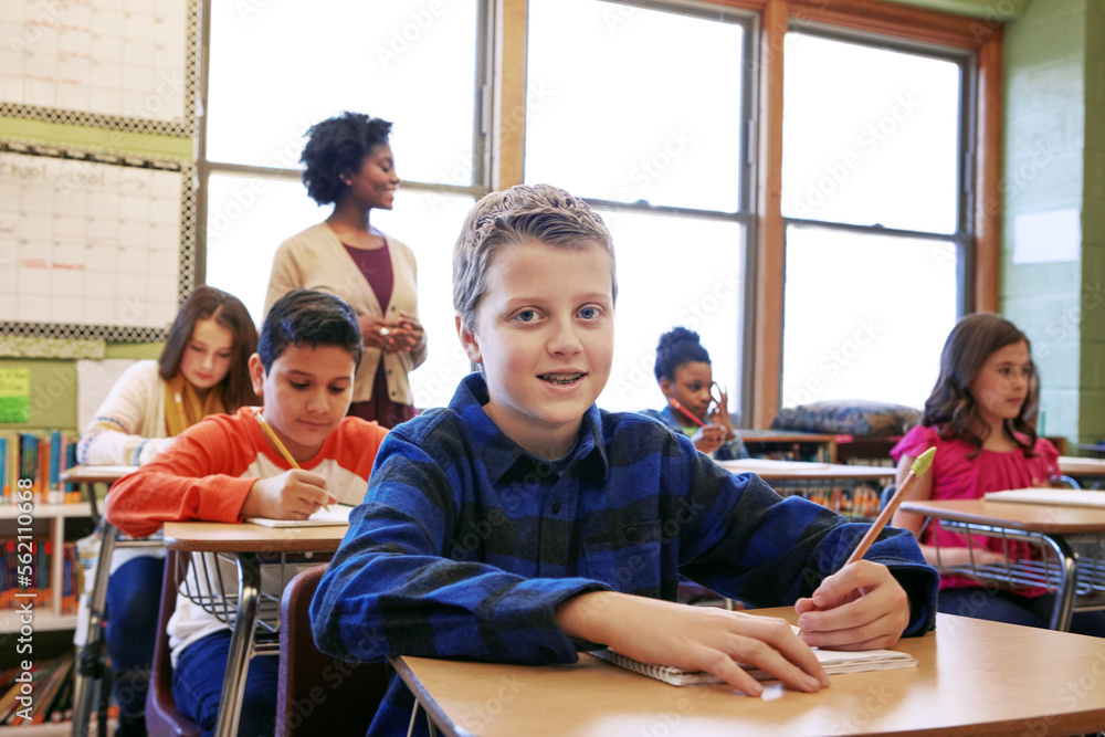 Education, boy and student portrait in classroom with notebook for ...