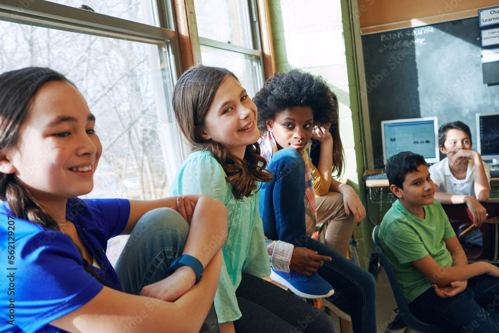 School children and portrait and diversity friends in a classroom to ...