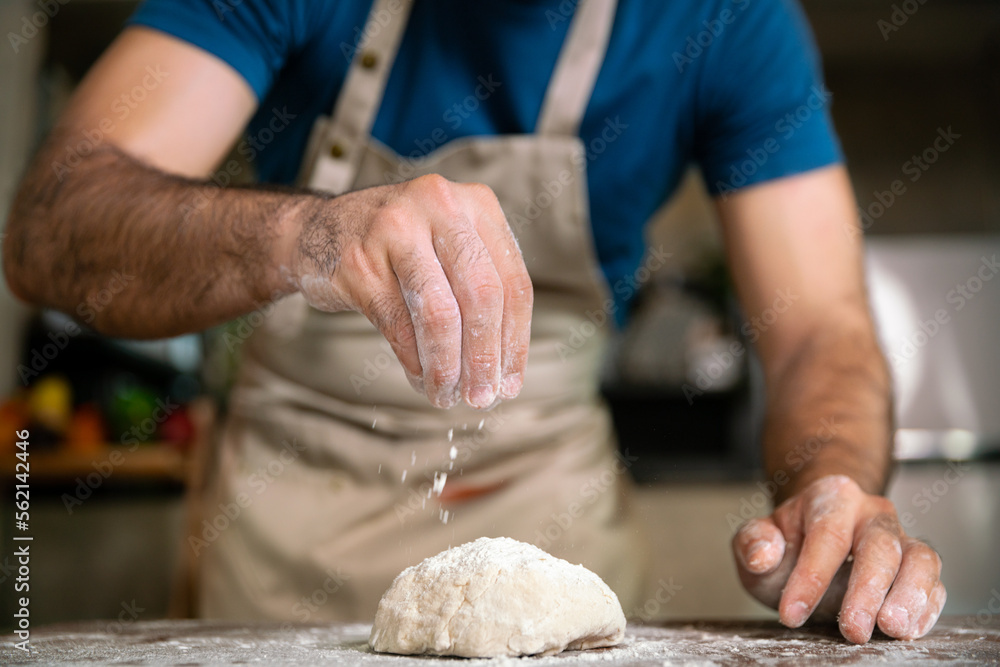 professional chef thresh flour white powder on wood table for sweet ...