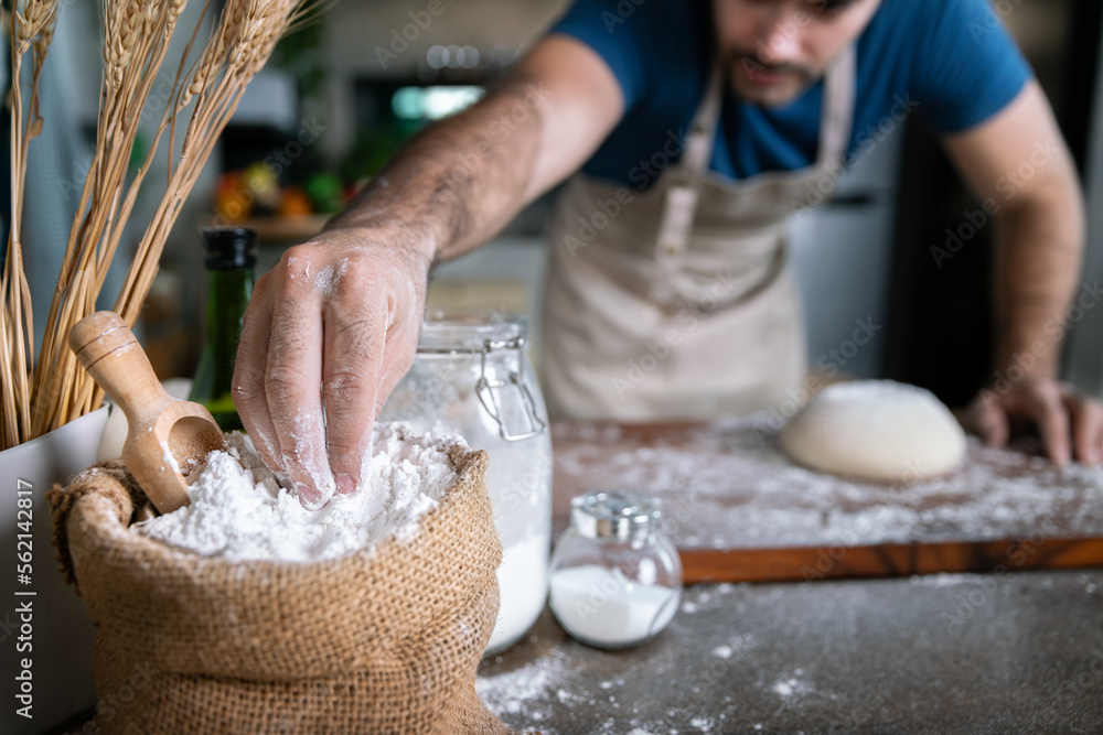 professional chef thresh flour white powder on wood table for sweet ...