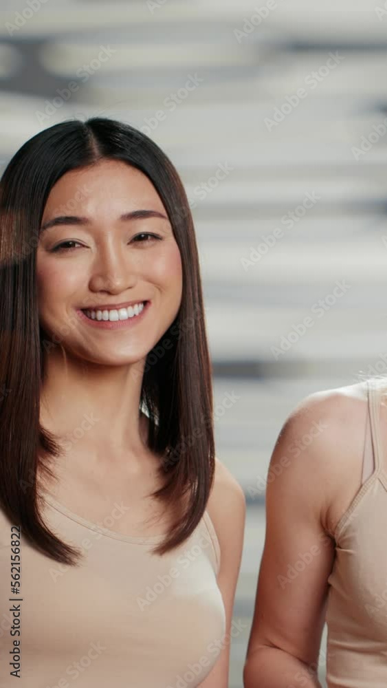 Vertical video: Group of diverse women smiling in body confidence ad ...