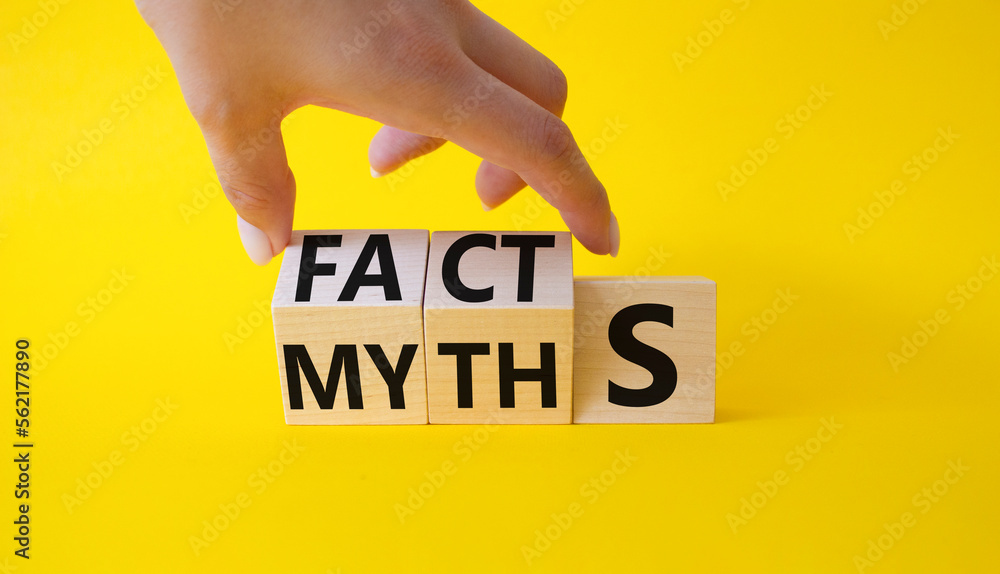 Facts vs Myths symbol. Businessman Hand turns cubes and changes word ...