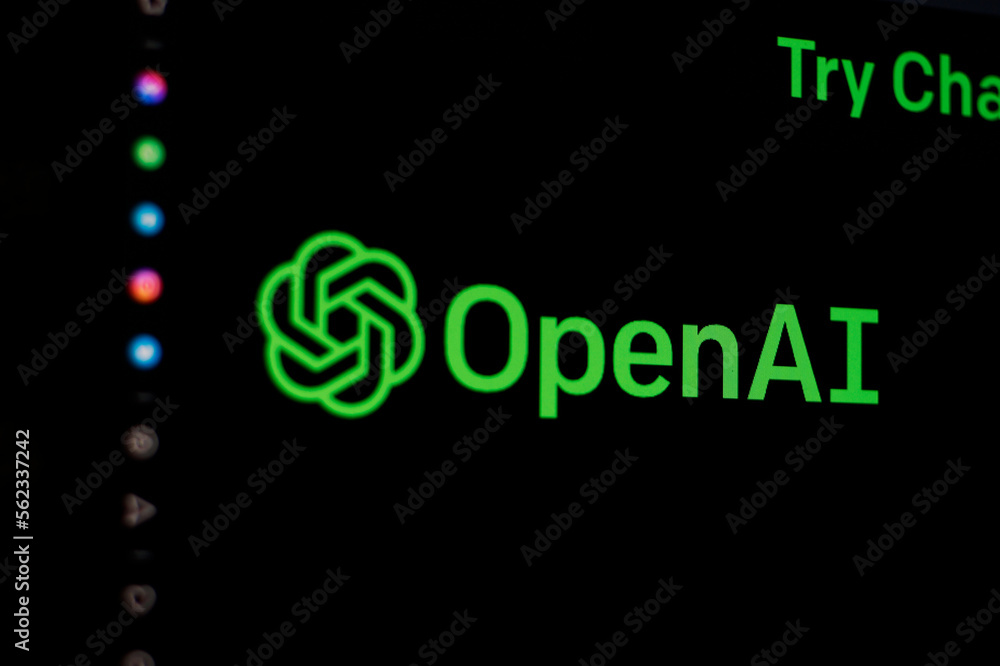 OpenAI logo seen on the screen of monitor computer. Open AI is an ...