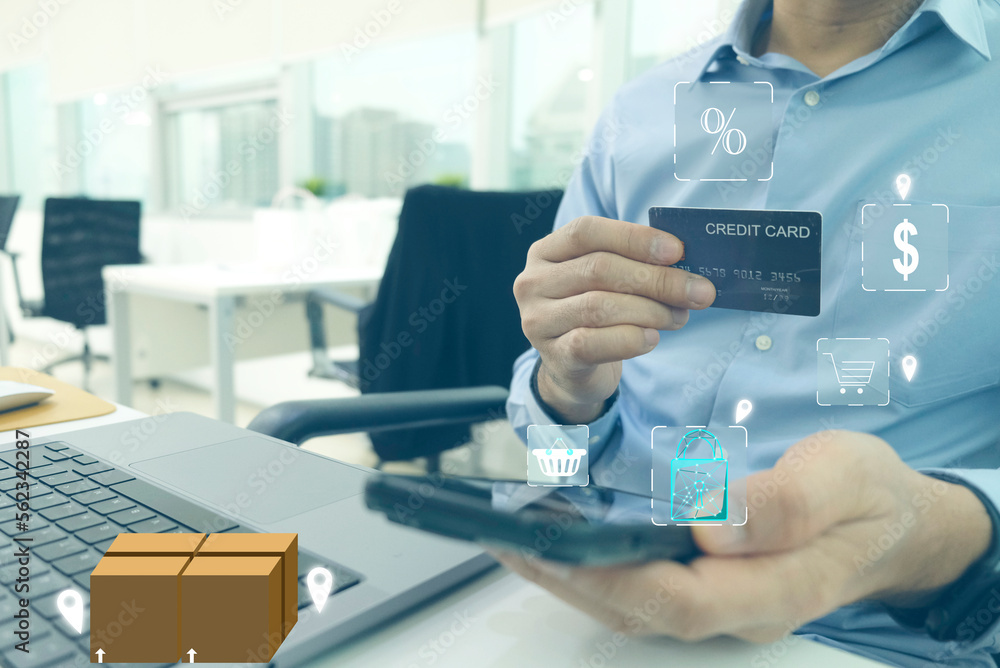 Businessman holding smartphone for shopping online, use credit card for ...