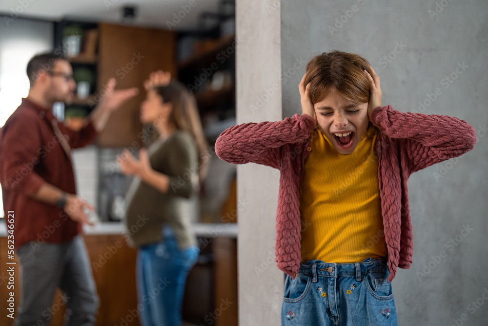 Little girl going through an unbearable situation at home, a family ...