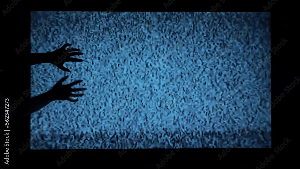 Hands on the background of the noise of the TV scary scene for a horror ...