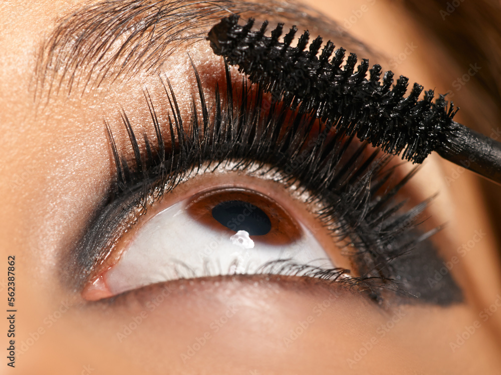 Beauty, makeup and eye of woman with mascara brush on lashes with black ...