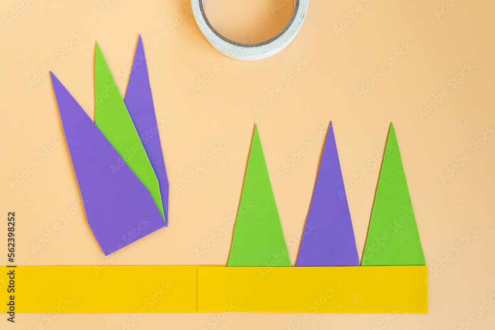 Mardi gras carnival jester hat on head made of paper . Step by step ...