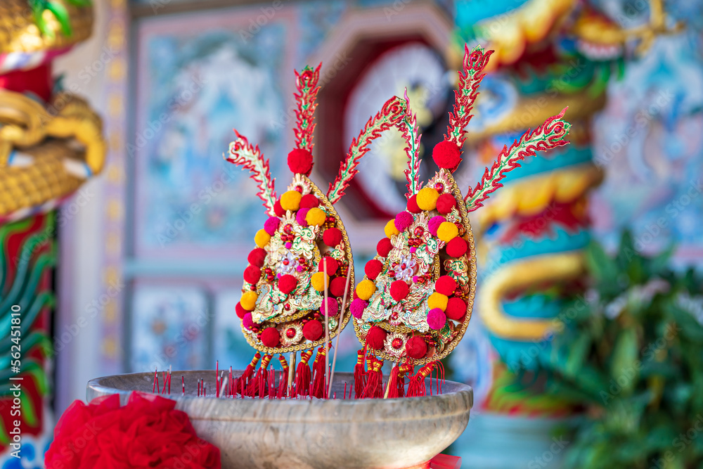 Red candles and burning incense sticks Paper gold with the Chinese ...