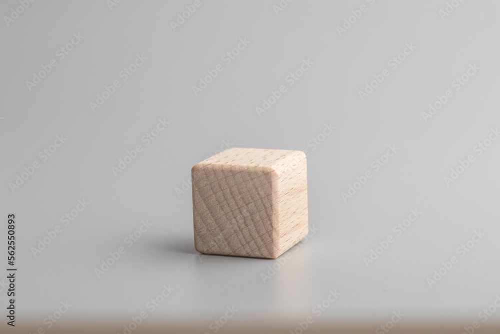 Simple empty wooden dice, one blank cubes made of wood with one central ...