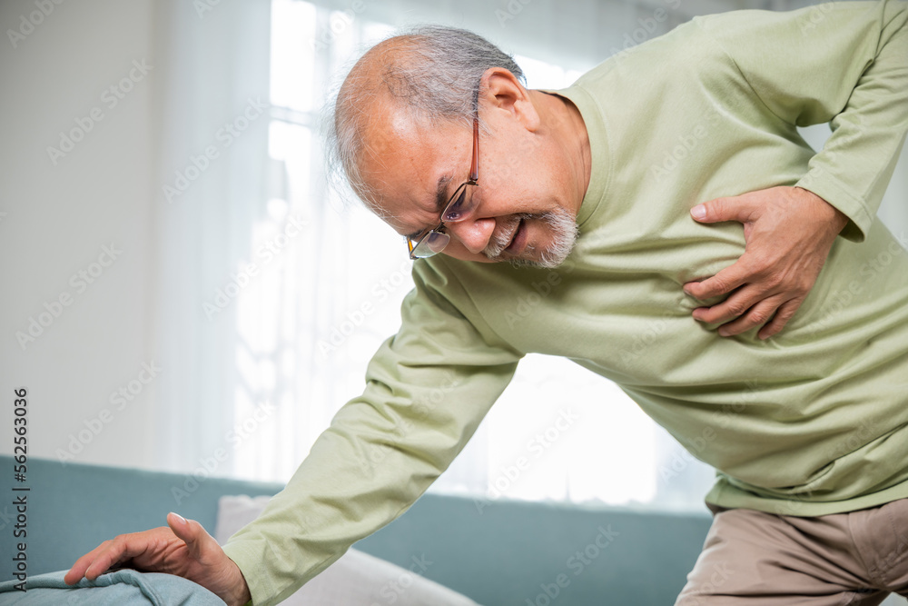 Senior man bad pain hand touching chest having heart attack, Asian ...