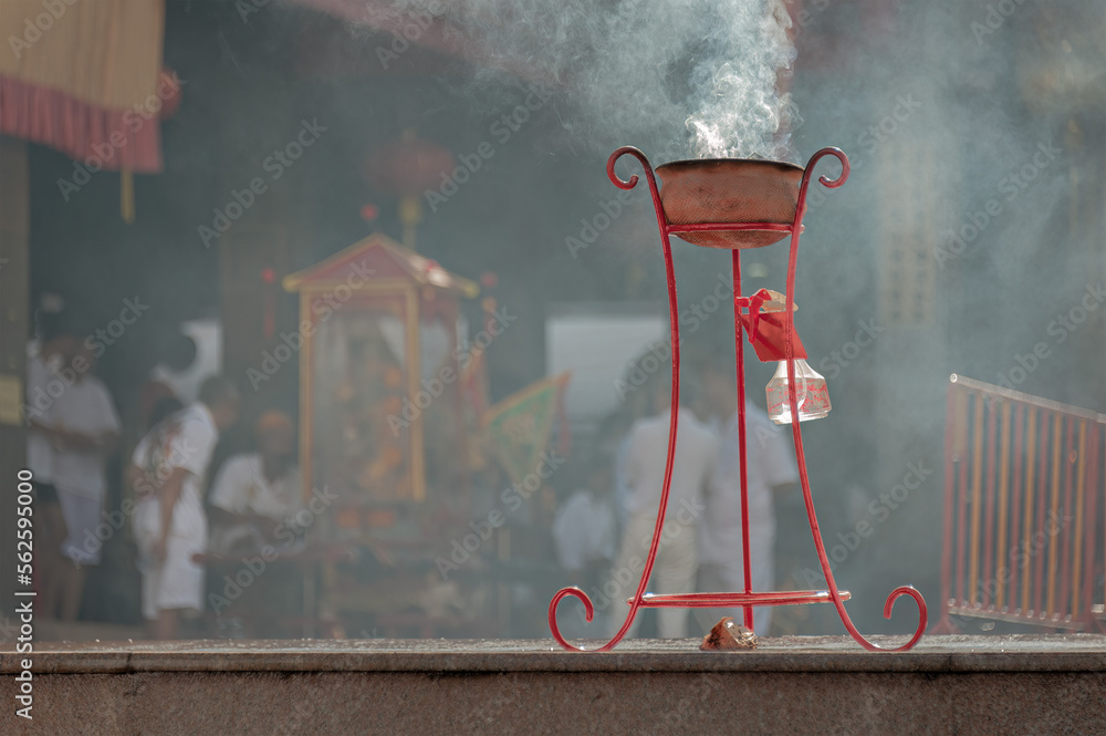 Poster Burning incense, the symbol of paying homage to the Gods and ...