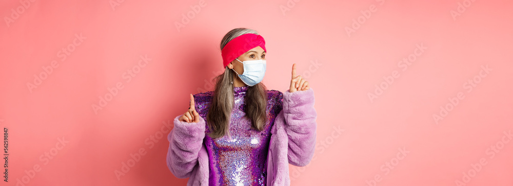 Covid-19, social distancing and fashion concept. Fancy asian senior ...