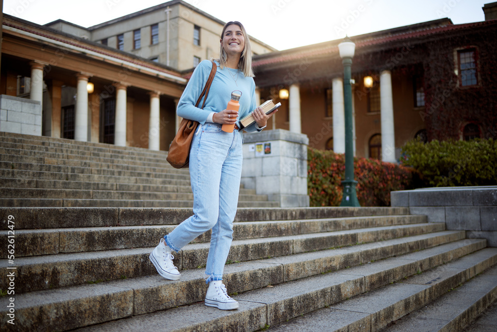 Woman, student on campus stairs and university, education with learning ...