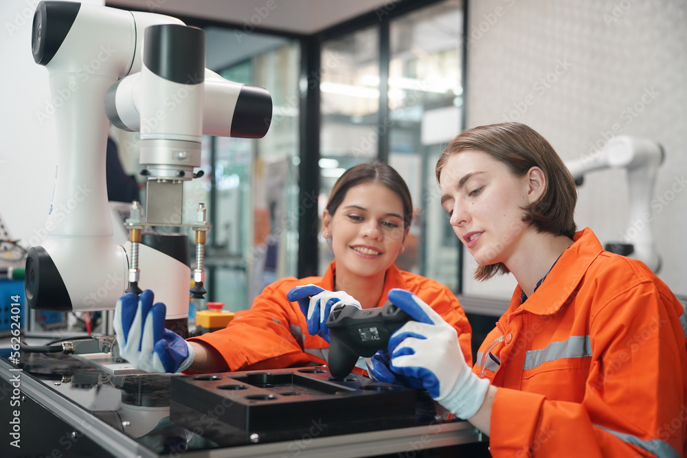 Engineer programming robot in robotics research facility Stock Photo ... Engineer programming robot in robotics research facility Stock Photo ...