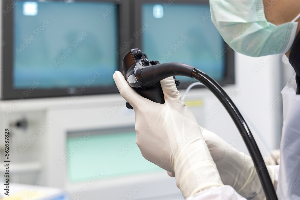 Close up photo of surgeon 's hands inside modern operating room in blue ...
