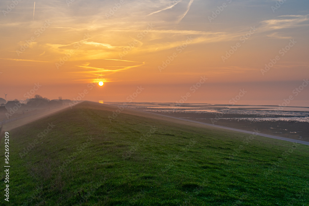 Dike of the seaside resort Norddeich in the northwest of East Frisia ...
