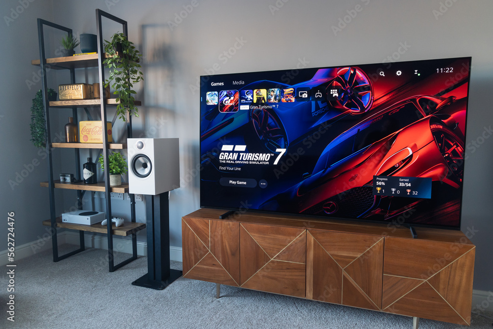 LONDON - JANUARY 06, 2023: PS5 PlayStation 5 games console on 4K TV in ...
