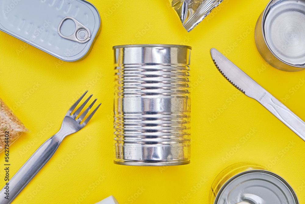 Disaster preparation food on yellow background. Stock Photo | Adobe Stock