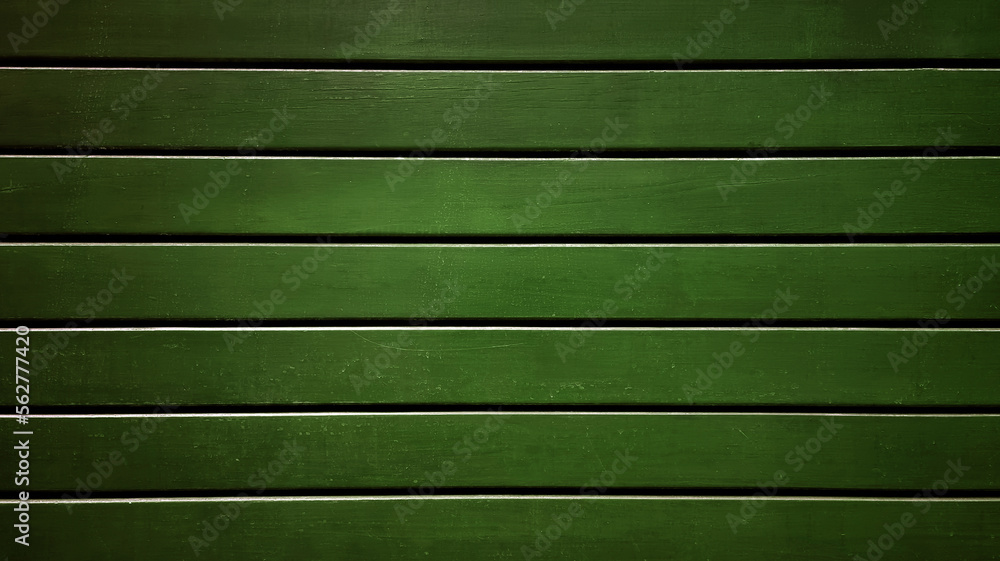 grunge wood panel painted in green color coming from natural tree ...