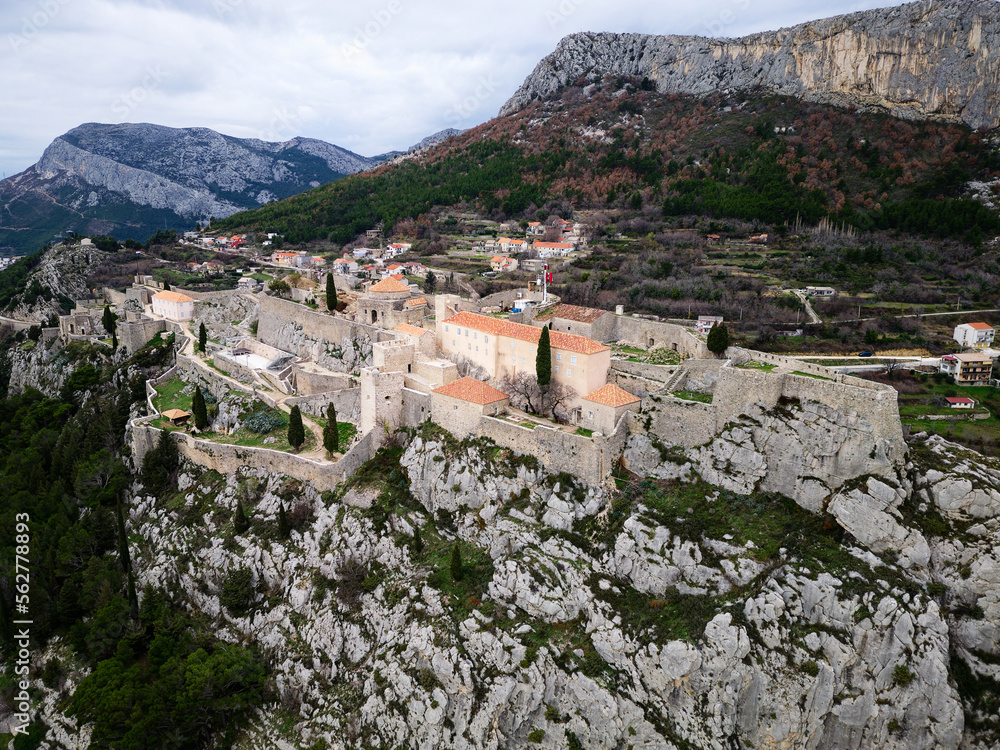 The Klis Fortress is a medieval fortress situated above a village ...
