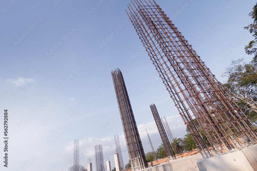Bored pile, Tall steel rods tied to the frame structure for strength ...