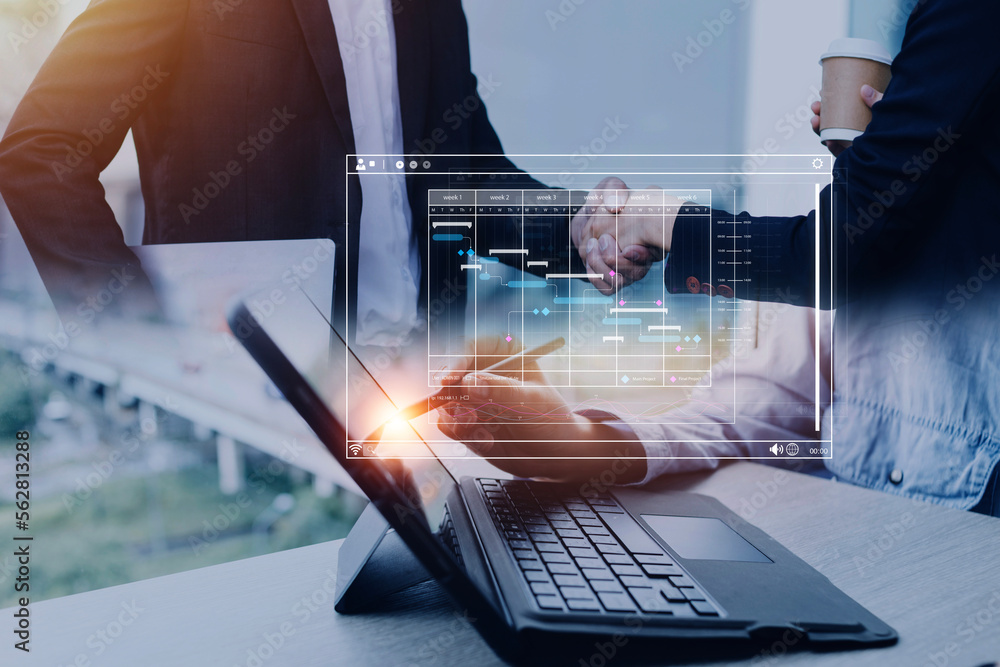 Analyst working with computer in Business Analytics and Data Management ...