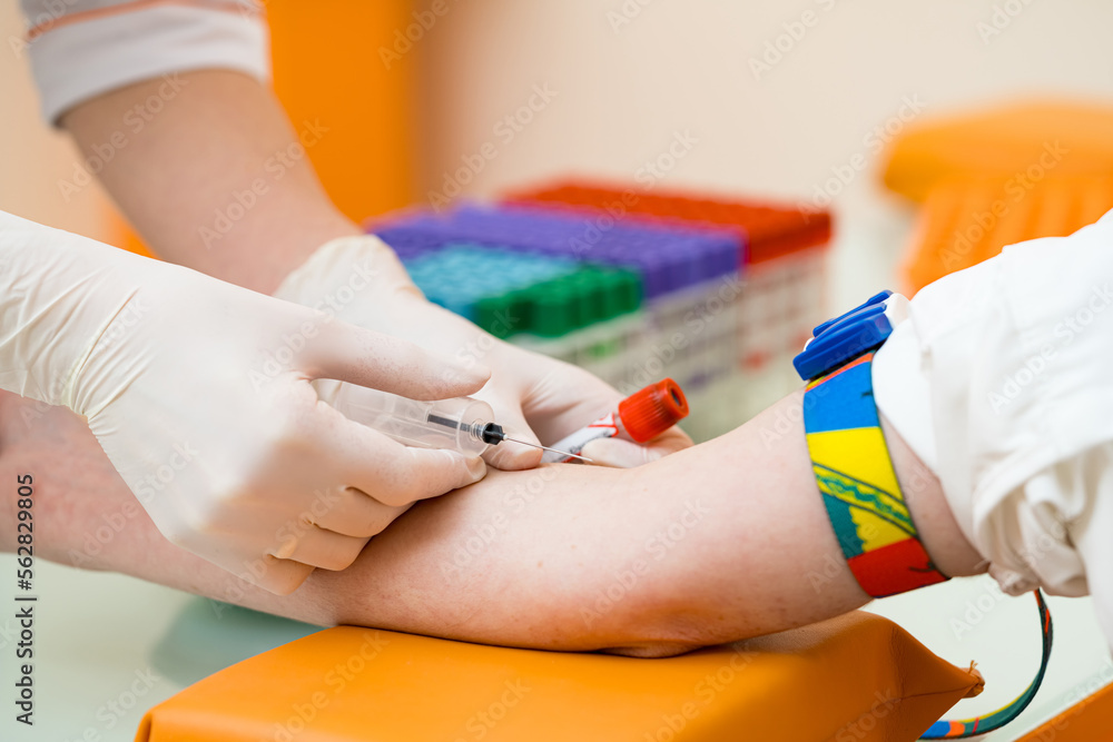 Blood collecting in hospital laboratory. Medical blood sampling ...