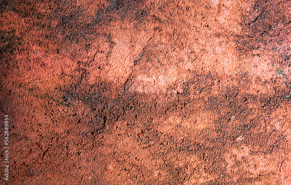 Rust colored concrete wall with black mildew stains grunge texture ...